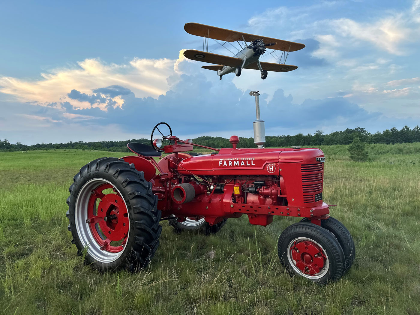 1942 PT-13 biplane flyover Farmall H